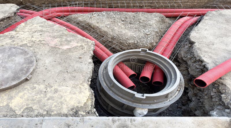 Installation of a Sewage Plastic Pipe during the Construction. Street ...