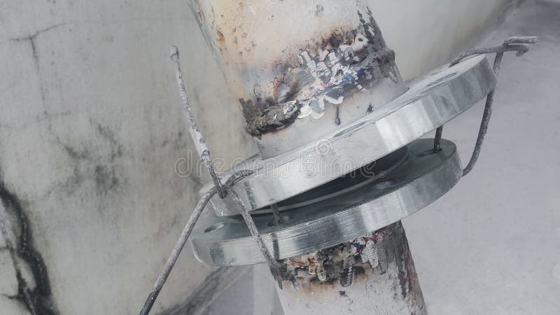 Installation of Stainless Steel Pipe Flanges for Interconnection. Stock ...