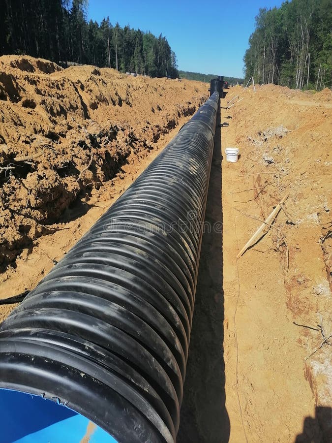 Installation of a Storm Sewer Pipe. Stock Photo - Image of installation ...