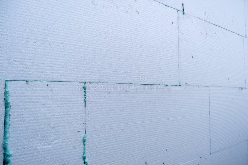 Installation of Styrofoam Insulation Sheets on House Facade Wall for ...