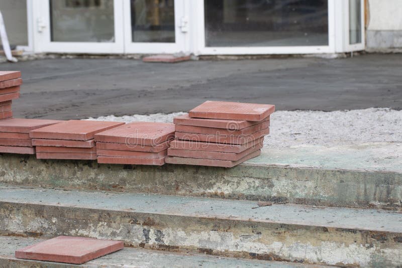 Installation of Tiles for Pedestrian Paths. Improvement of the City ...