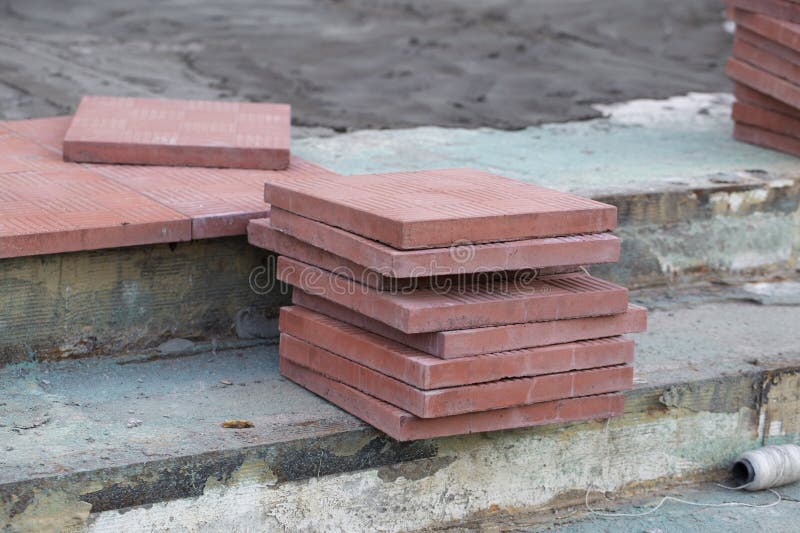 Installation of Tiles for Pedestrian Paths. Improvement of the City ...