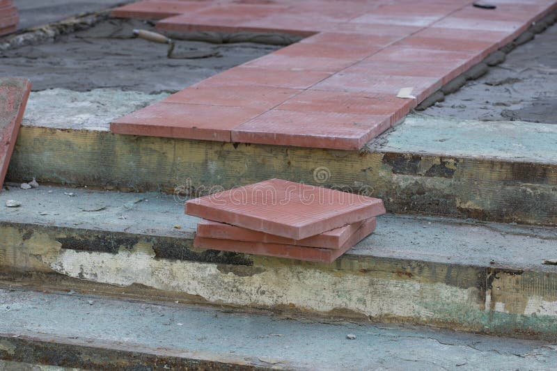 Installation of Tiles for Pedestrian Paths. Improvement of the City ...