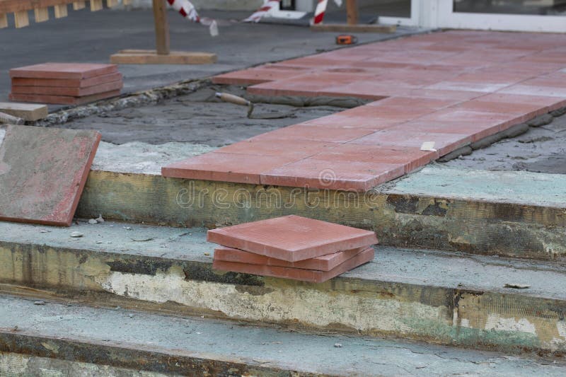 Installation of Tiles for Pedestrian Paths. Improvement of the City ...