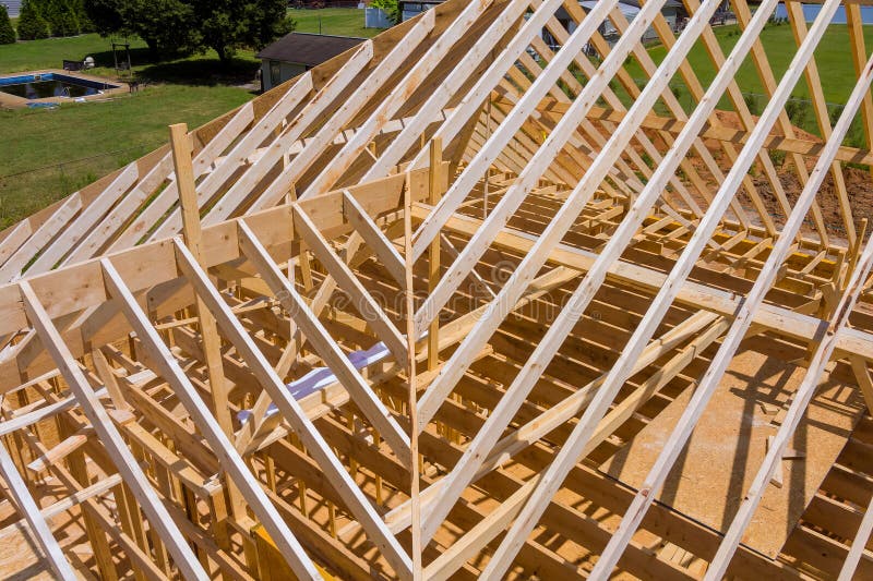 Installation of Timber Roofing Truss Frames by a Building Under ...