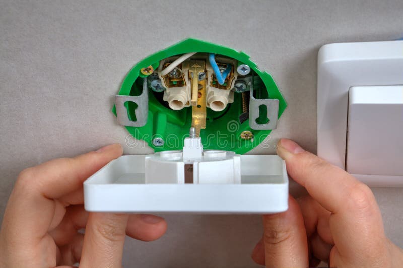 Installation of Wall Socket in the Junction Box, Hands Closeup. Stock ...