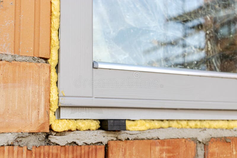 Installation of a Window in a Brick Building. Industrial Engineering ...