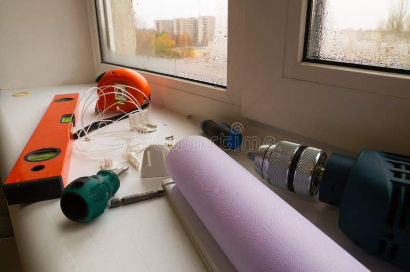 Installation of a Window Roller with a Holder. Installation Tool ...