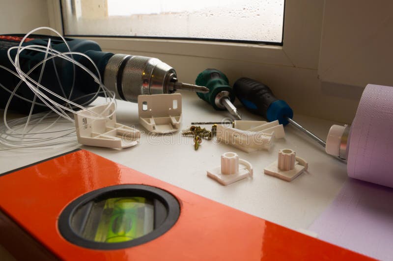 Installation of a Window Roller with a Holder. Installation Tool ...