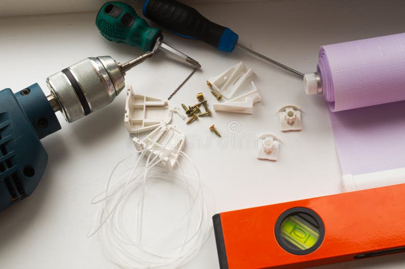 Installation of a Window Roller with a Holder. Installation Tool ...