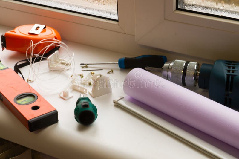 Installation of a Window Roller with a Holder. Installation Tool ...