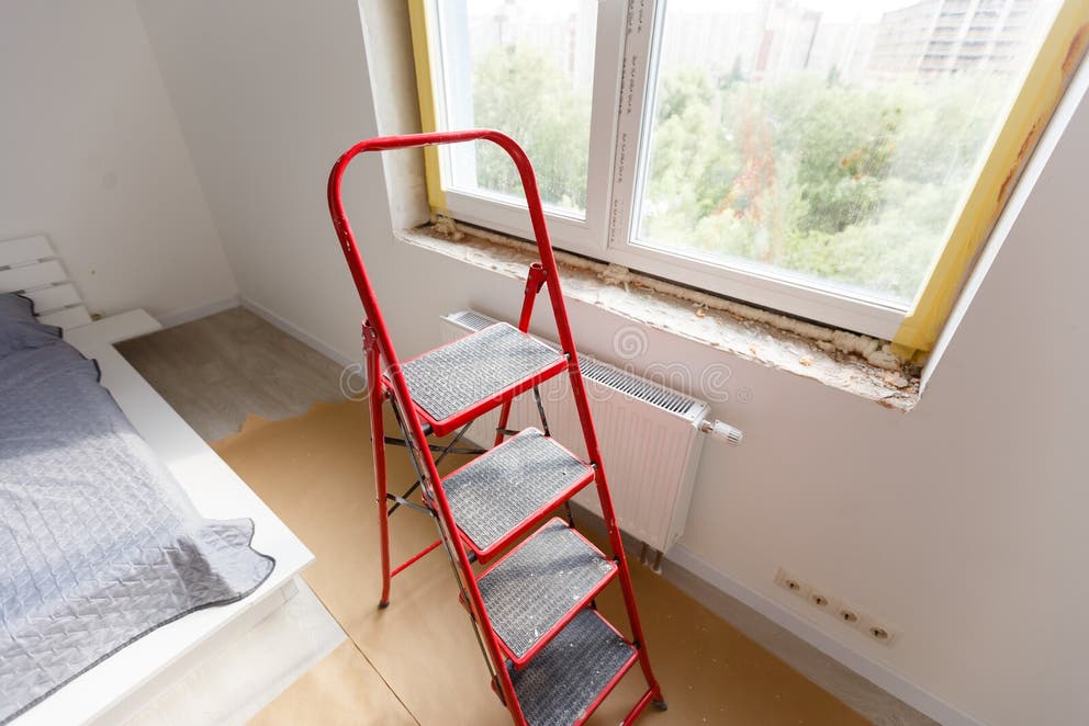 Installation of Windows. Polyurethane Foam on the Slope of the Window ...
