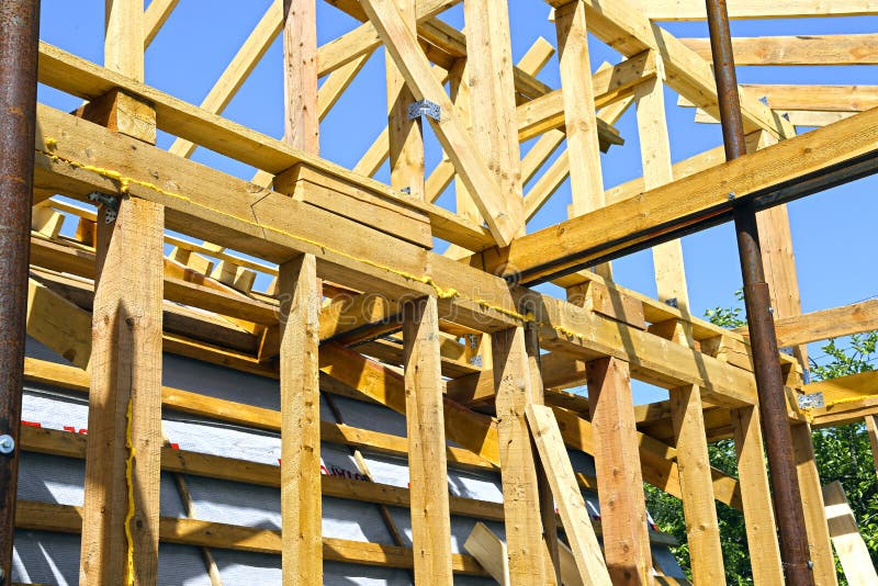 Installation of Wooden Beams at Construction of Frame House Stock Photo ...