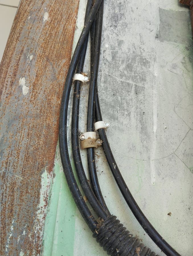 Installed Old Electric Power Cable Attached To the Wall Stock Image ...