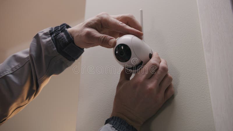 Installer Puts Security Camera on Wall Mount Stock Photo - Image of ...