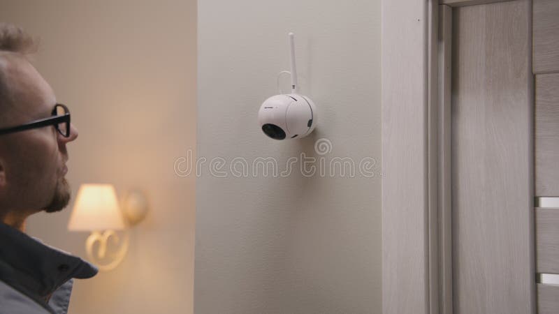 Installer Puts Security Camera on Wall Mount Stock Photo - Image of ...