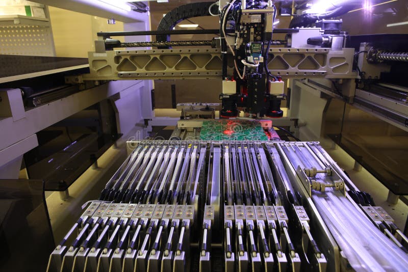 Installer of SMD Parts on Boards and Soldering Parts. Machine for ...