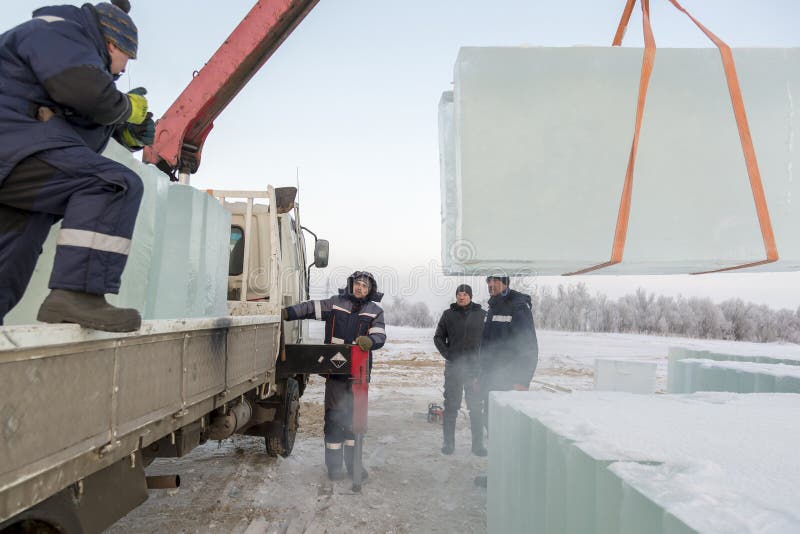 Installers Unloading Ice Blocks for an Ice Town Stock Photo - Image of ...