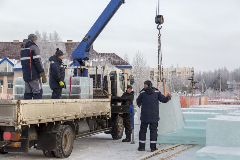Installers Unloading Ice Blocks for an Ice Town Stock Photo - Image of ...
