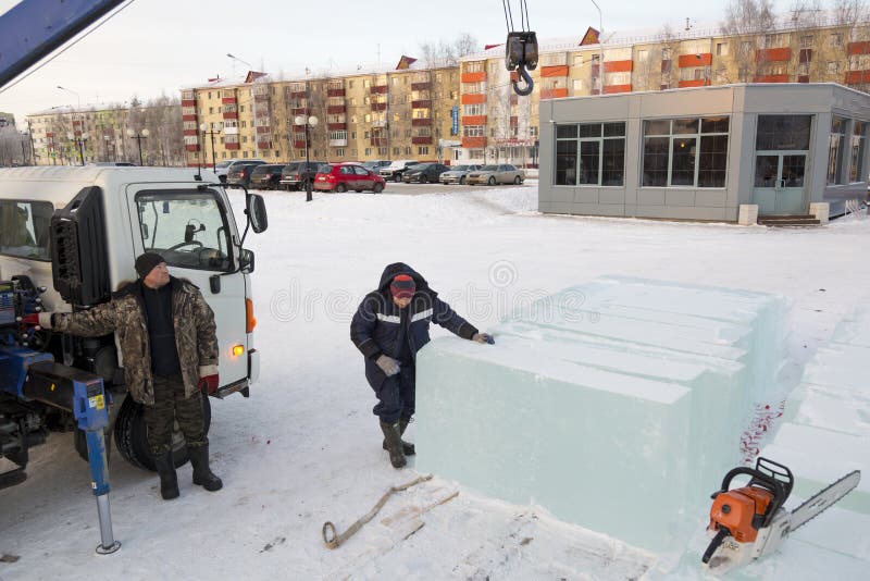Installers Unloading Ice Blocks for an Ice Town Stock Photo - Image of ...