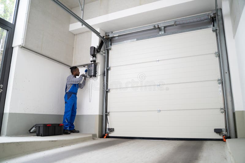 Installing Automatic Garage Door or Gate Stock Image - Image of ...