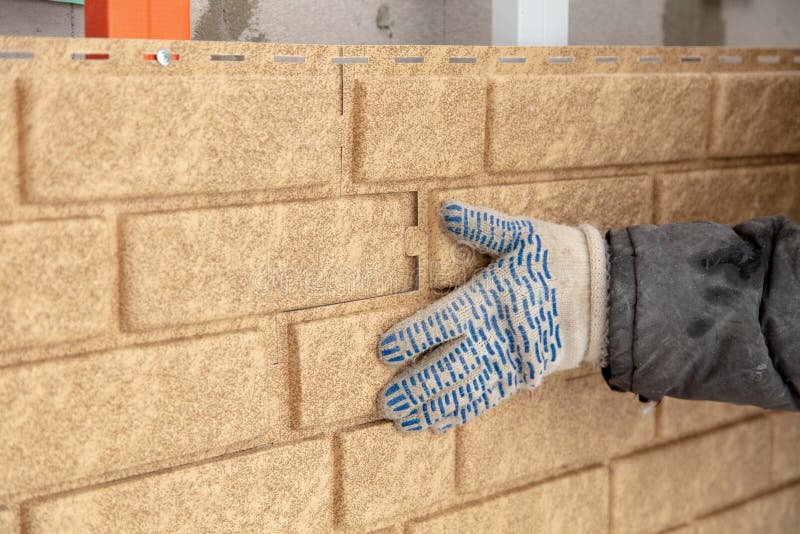 Installing Brick Siding on the Wall of the House Stock Photo - Image of ...
