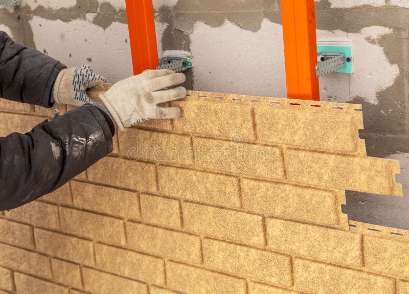 Installing Brick Siding on the Wall of the House Stock Photo - Image of ...