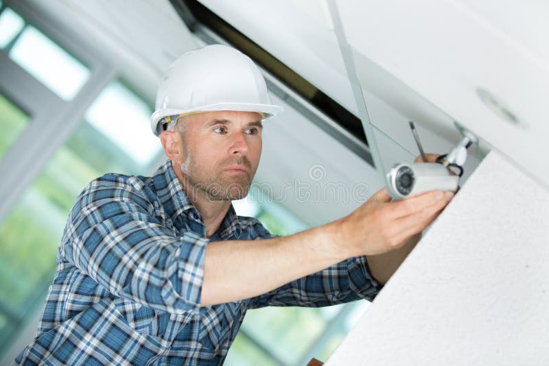 Installing Cameras in Building Stock Photo - Image of angle, connection ...