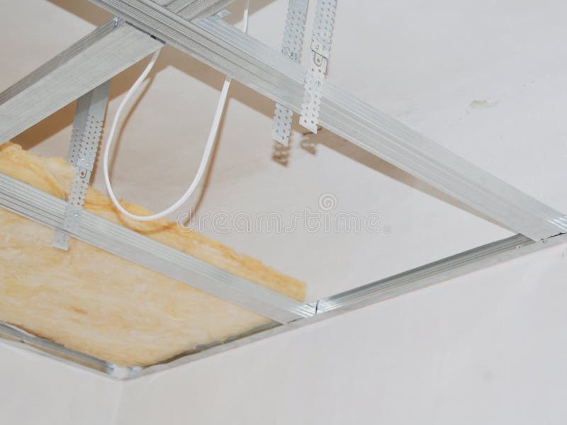 Installing Ceiling Metal Frame with U-shaped Brackets and Mineral Wool ...