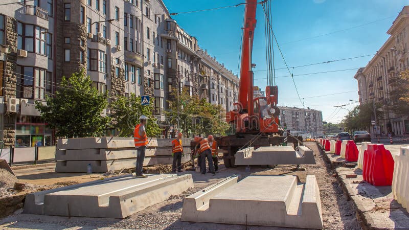 Installing Concrete Plates by Crane at Road Construction Site Timelapse ...