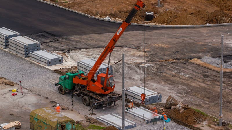 Installing Concrete Plates by Crane at Road Construction Site Timelapse ...