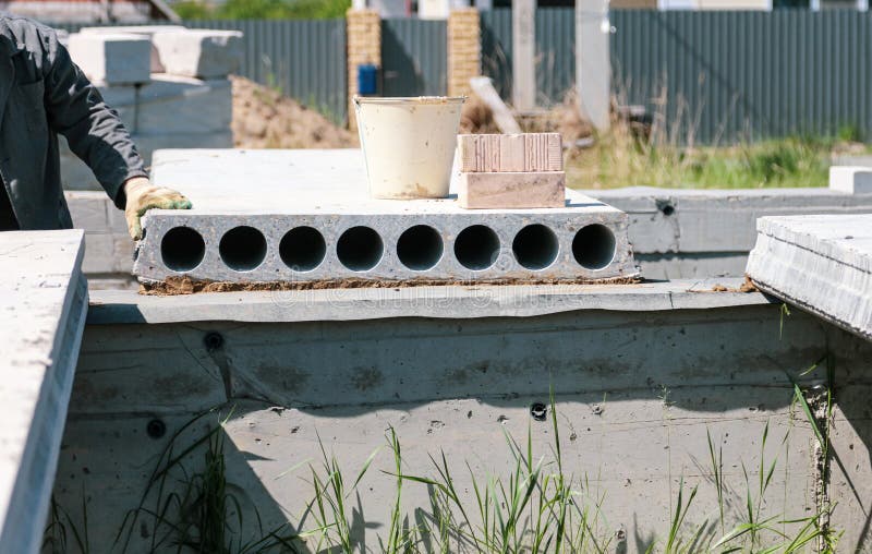 Installing Concrete Slabs at a Construction Site at Home Stock Photo ...