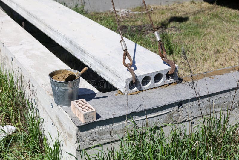 Installing Concrete Slabs at a Construction Site at Home Stock Photo ...