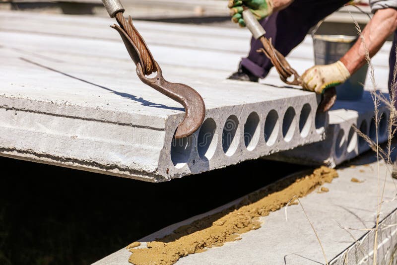 Installing Concrete Slabs at a Construction Site at Home Stock Photo ...