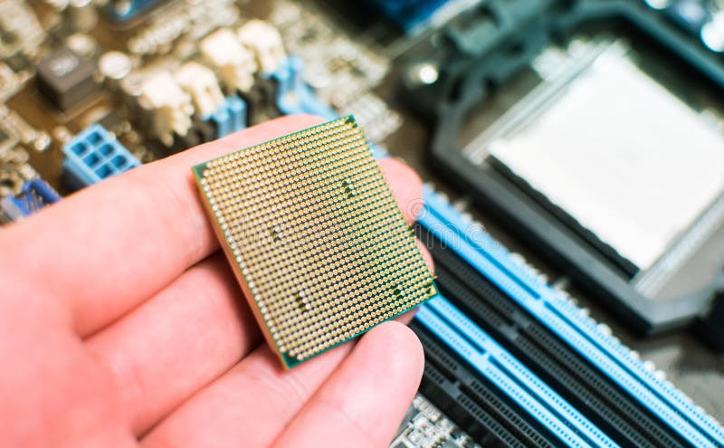 Installing the CPU into the Motherboard Stock Photo - Image of digital ...