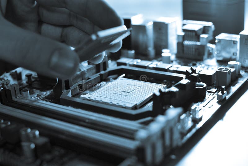 Installing the CPU into the Motherboard Stock Image - Image of closeup ...