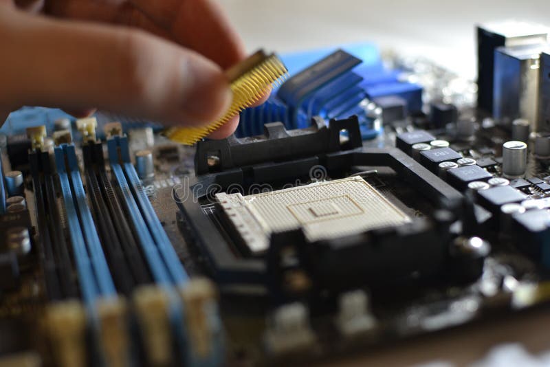 Installing the CPU into the Motherboard Stock Image - Image of power ...