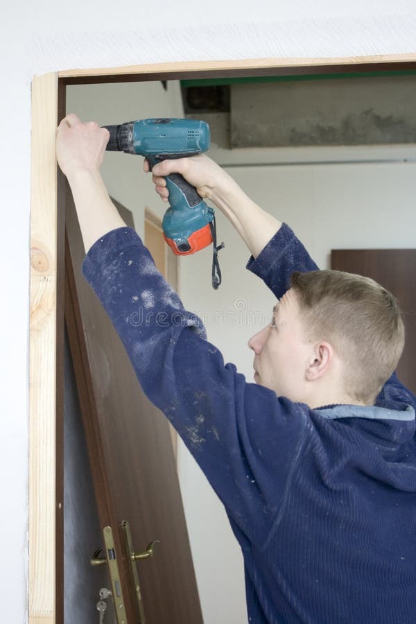 Installing the doors stock photo. Image of worksite, work - 8948934