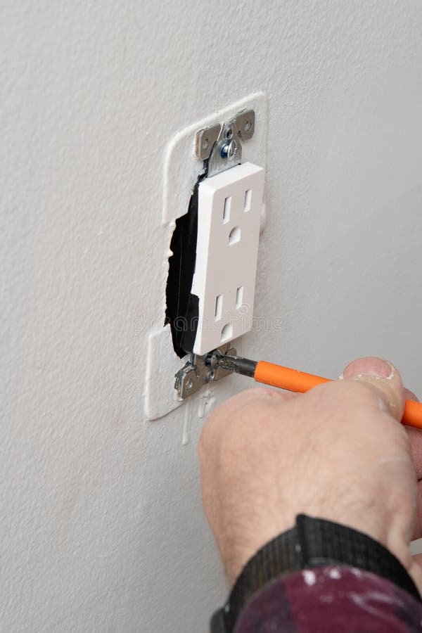 Installing an Electrical Outlet on the Wall Stock Image - Image of ...
