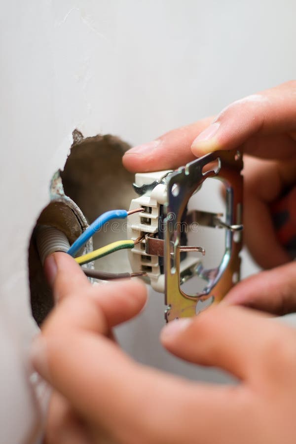 Installing An Electrical Plug / Contact Stock Photo - Image of ...