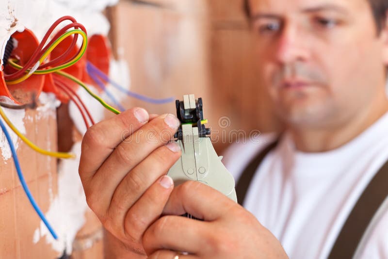 Installing Electricity in a New Building Stock Image - Image of copper ...