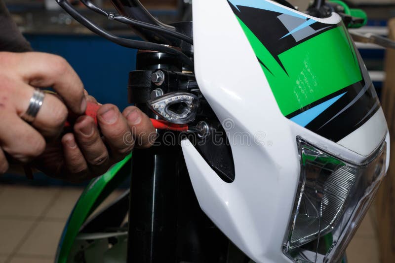 Installing the Front Lamp with a Plastic Lining on the Motorcycle Stock ...