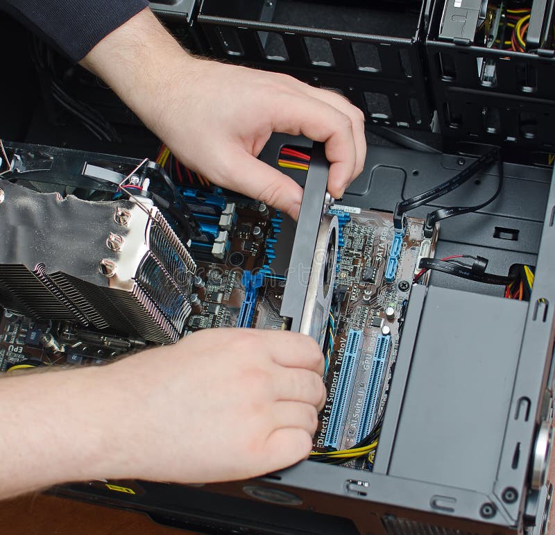 Installing of graphic card stock image. Image of disk - 35333819