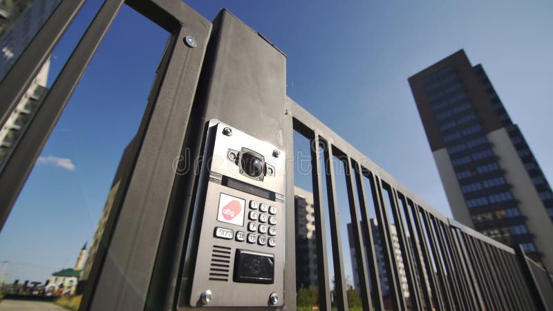 Installing Intercom at Gate for Security of Residential Complex Stock ...