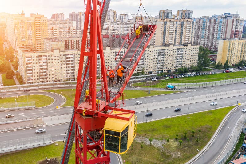 Installing the Jib of a Construction Crane Using Another Crane on the ...