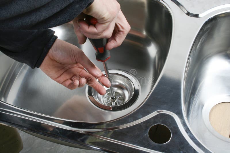 Installing a Kitchen Sink Using a Screwdriver Stock Photo - Image of ...