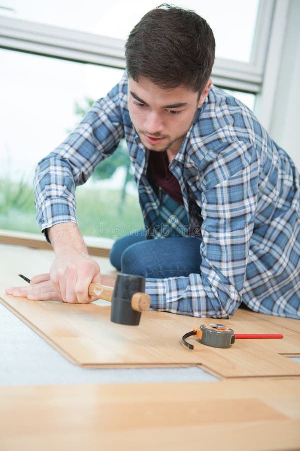 Installing Laminate Flooring Fitting Next Piece Stock Photo - Image of ...