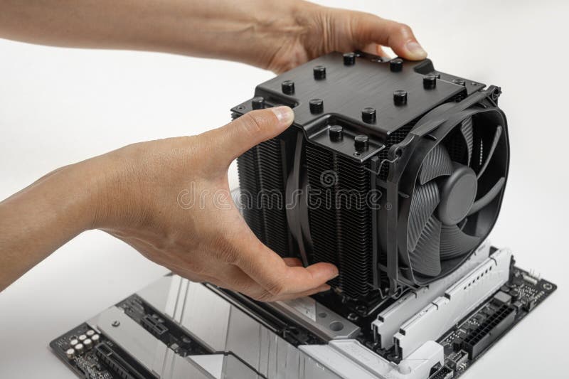 Installing a Large Cooler on a Computer Processor. Stock Image - Image ...