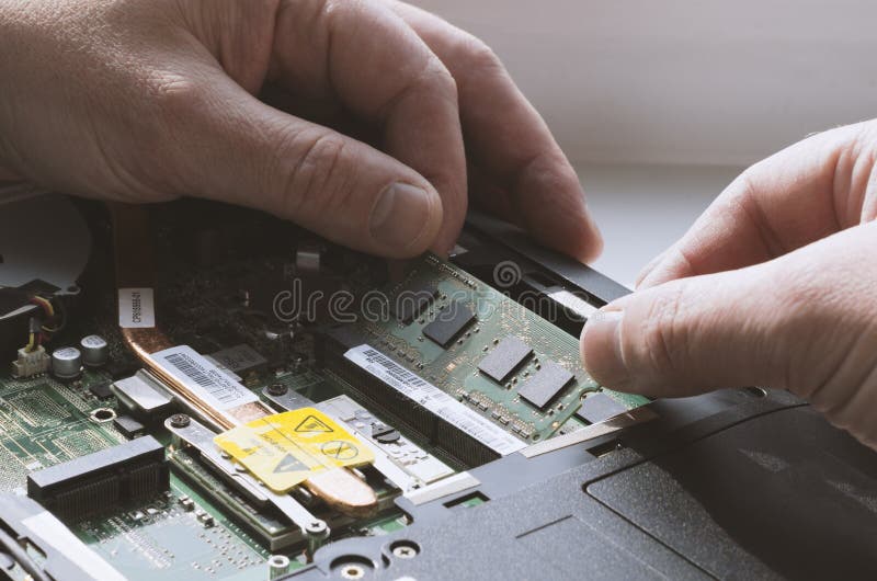 Installing Memory Modules in the Laptop Close-up Stock Photo - Image of ...