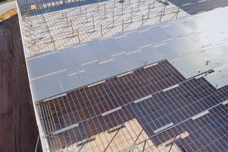 Installing a Metal Construction Frame for Steel Warehouse Work on a ...